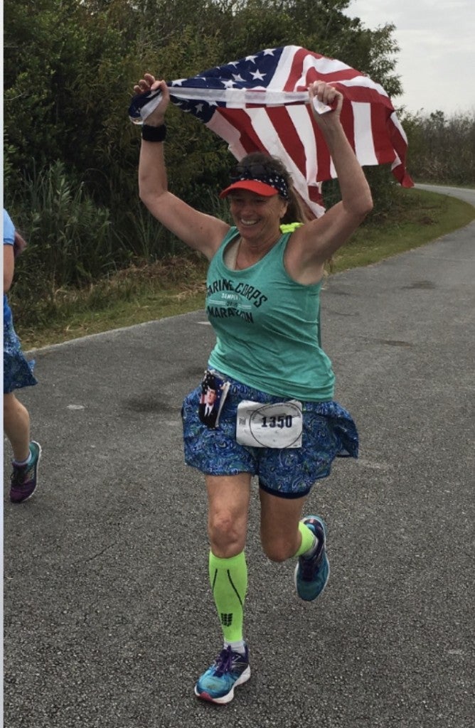 Runners Carry Flags To Honor Loved Ones Lost Too Soon